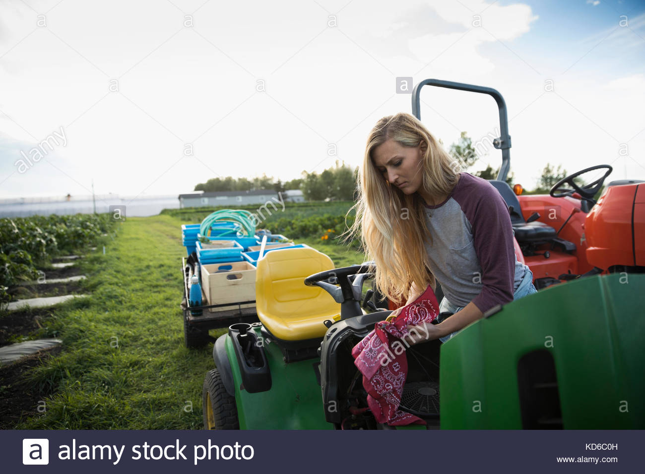 Farm woman on tractor hi-res stock photography and images - Alamy