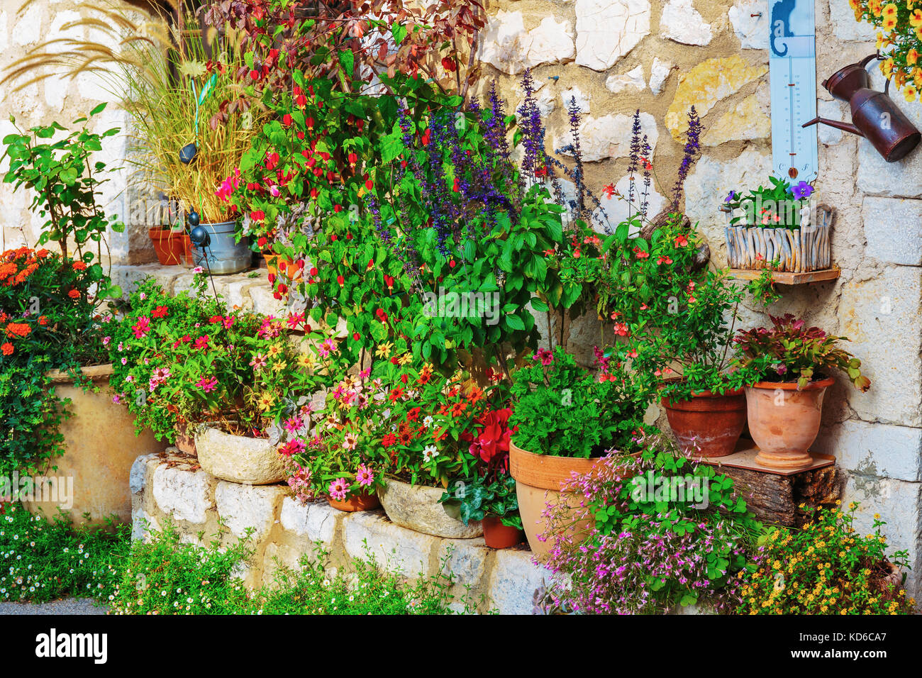 Rural house decorated with flowers in pots, Gourdon France Stock Photo ...