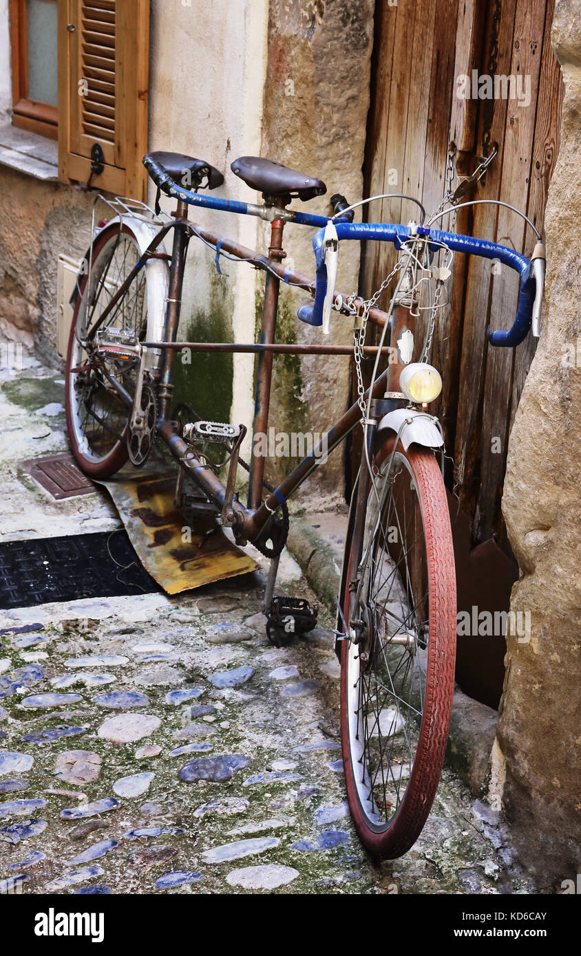 Old bicycle on a medieval street in France Stock Photo - Alamy