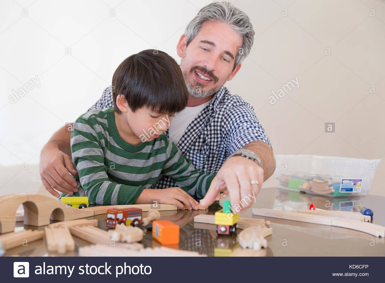 Family playing with train set hi-res stock photography and images - Alamy