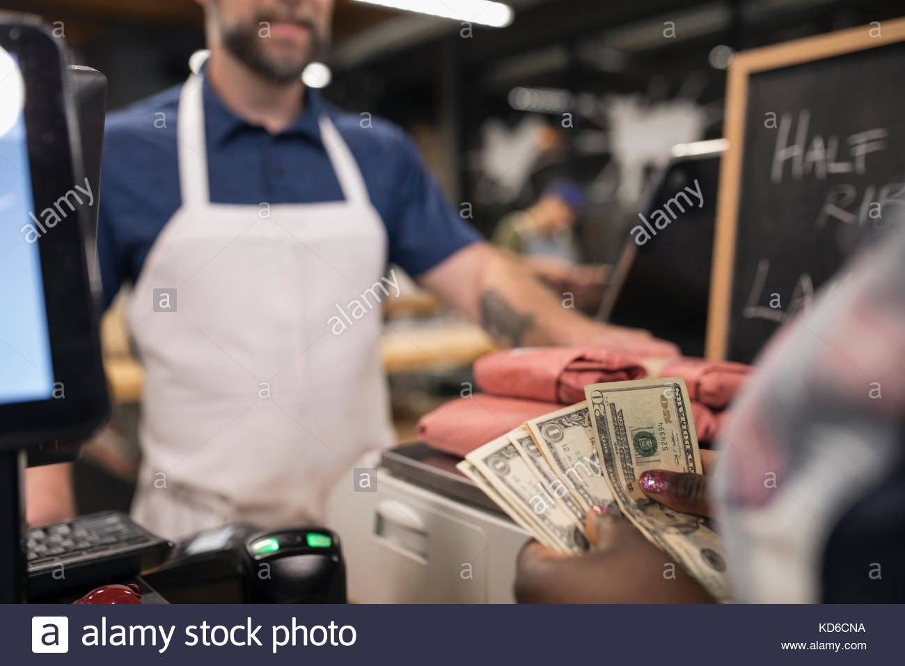 Paying cash register hi-res stock photography and images - Alamy