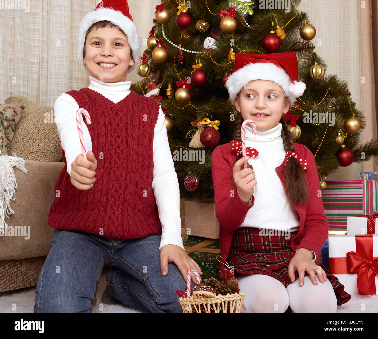 Child play in christmas decoration at home, happy emotion, winter ...