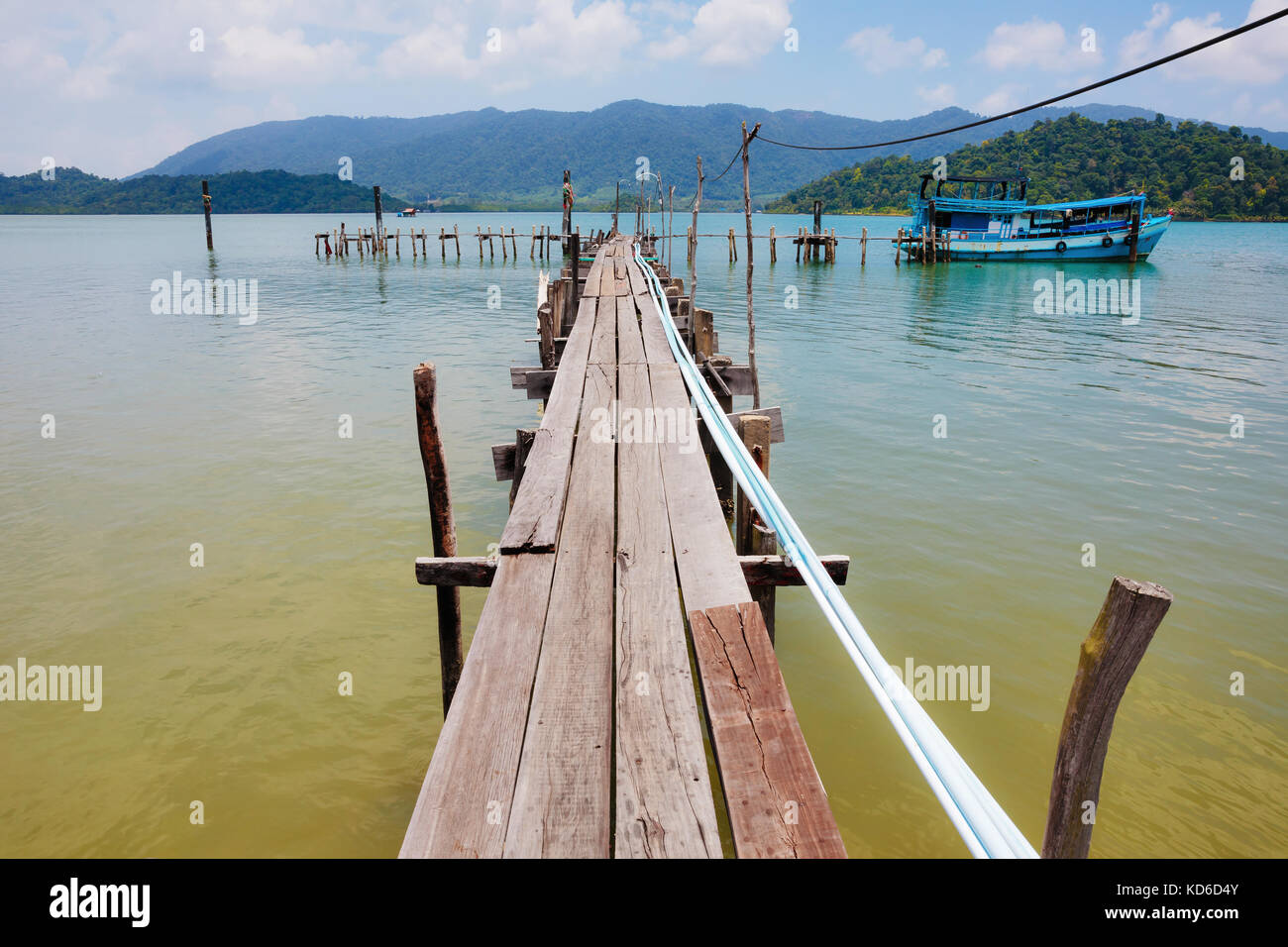 Old wooden jetty on exotic beach of a tropical island Koh Chang ...