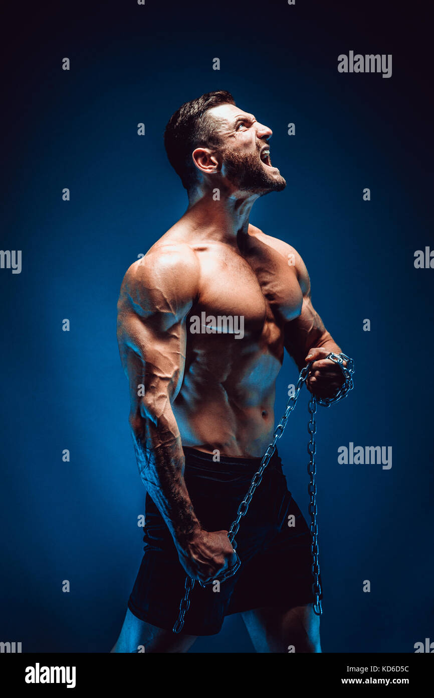 Screaming man with chain Stock Photo - Alamy