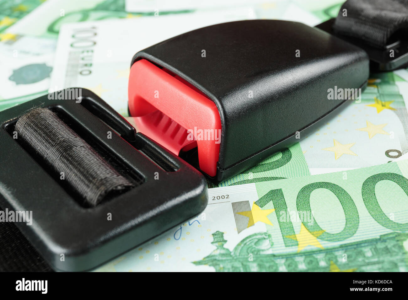 safety belt on euro banknotes Stock Photo - Alamy