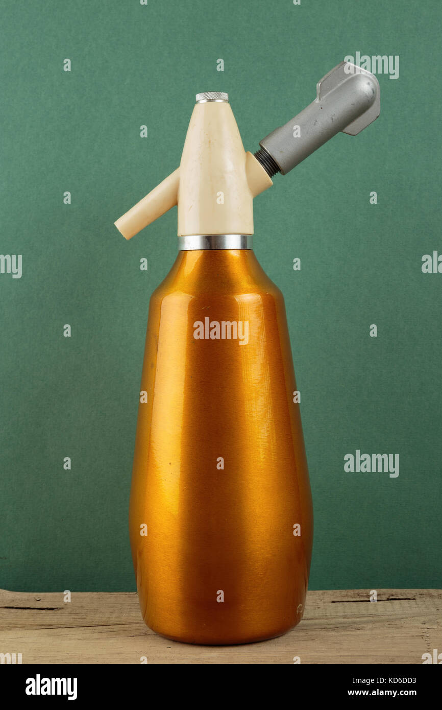 An old vintage aluminum siphon Stock Photo - Alamy