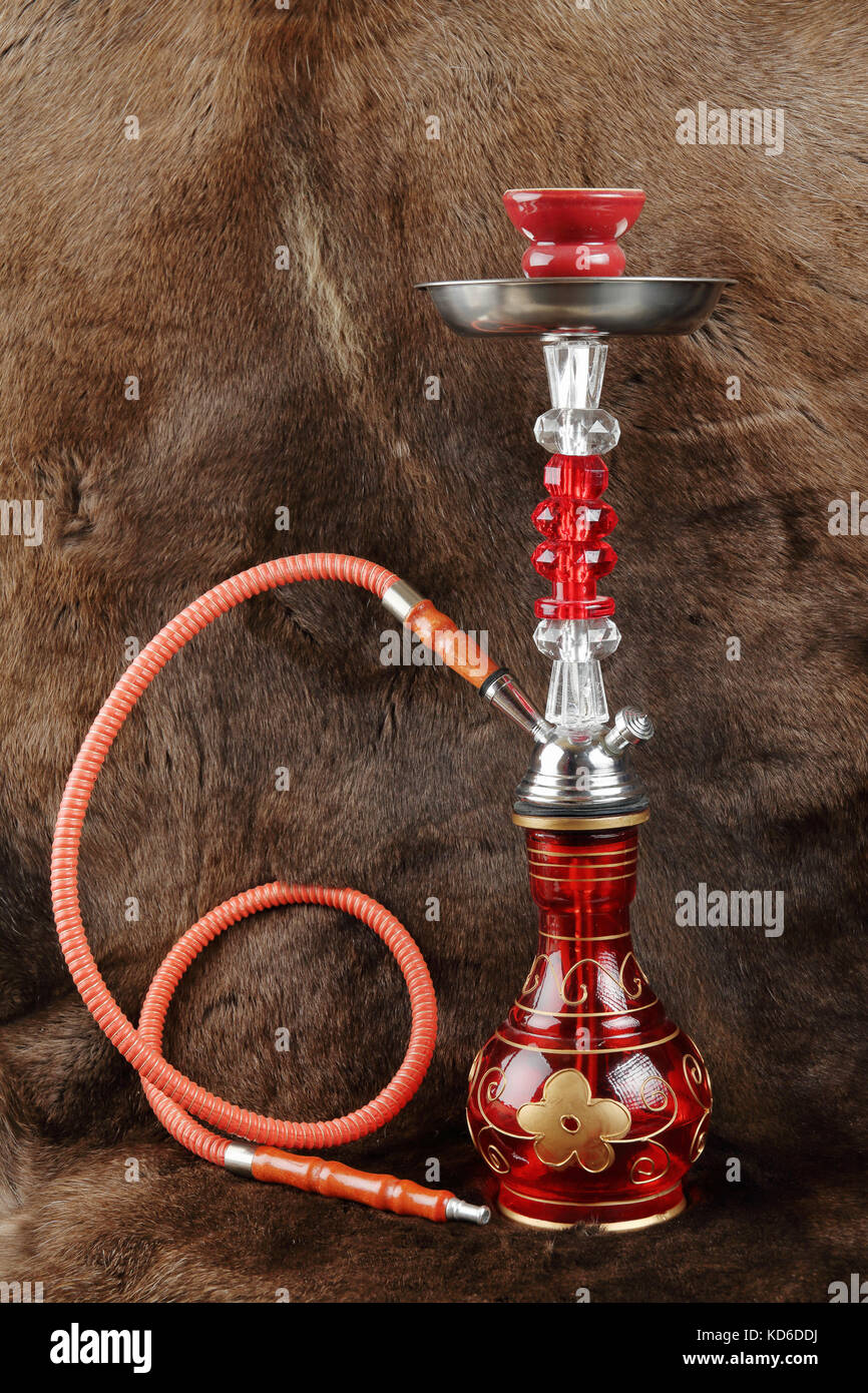 Red hookah on the fur Stock Photo - Alamy