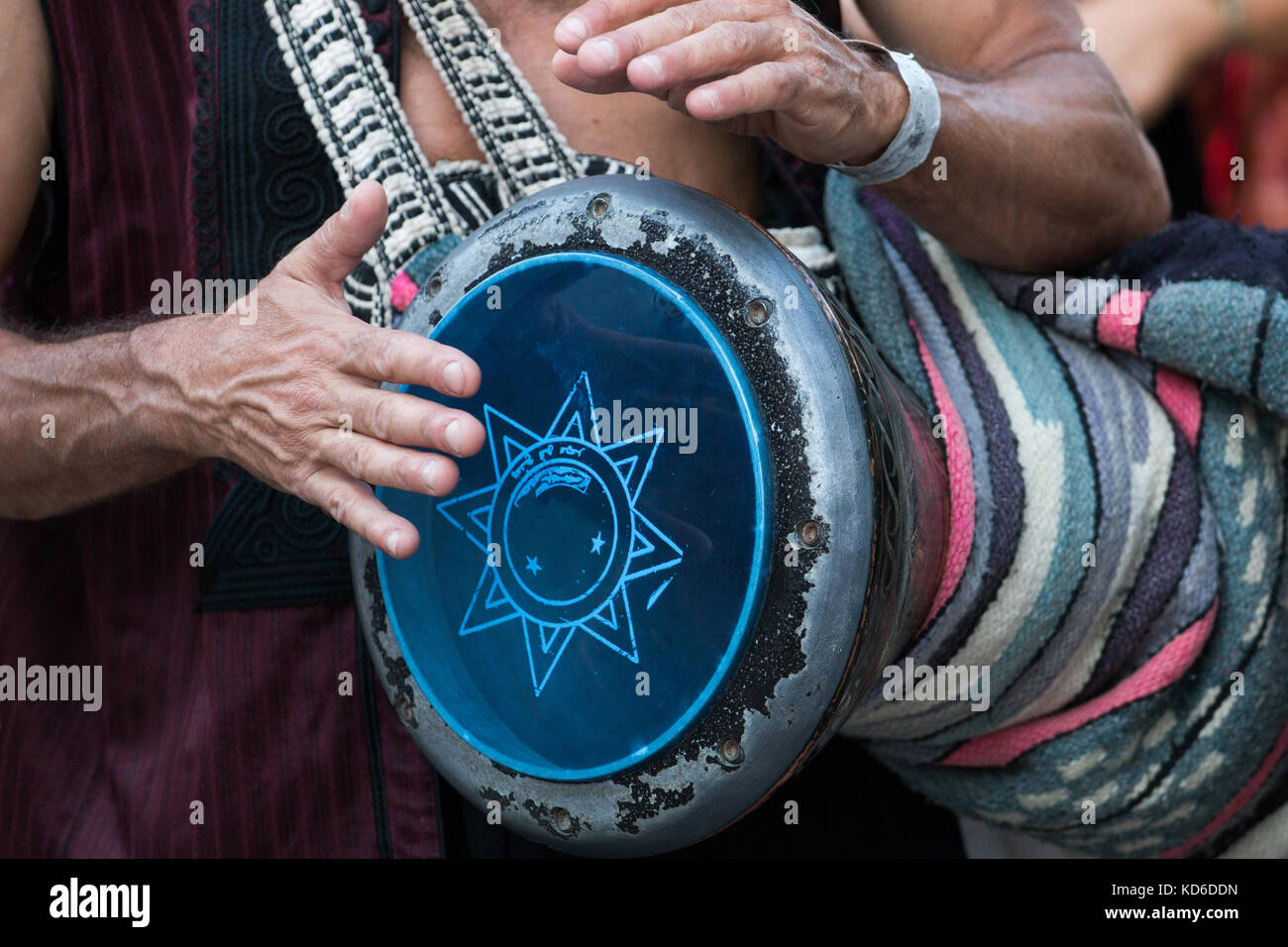 Close up view of a man playing a medieval hand drum Stock Photo - Alamy