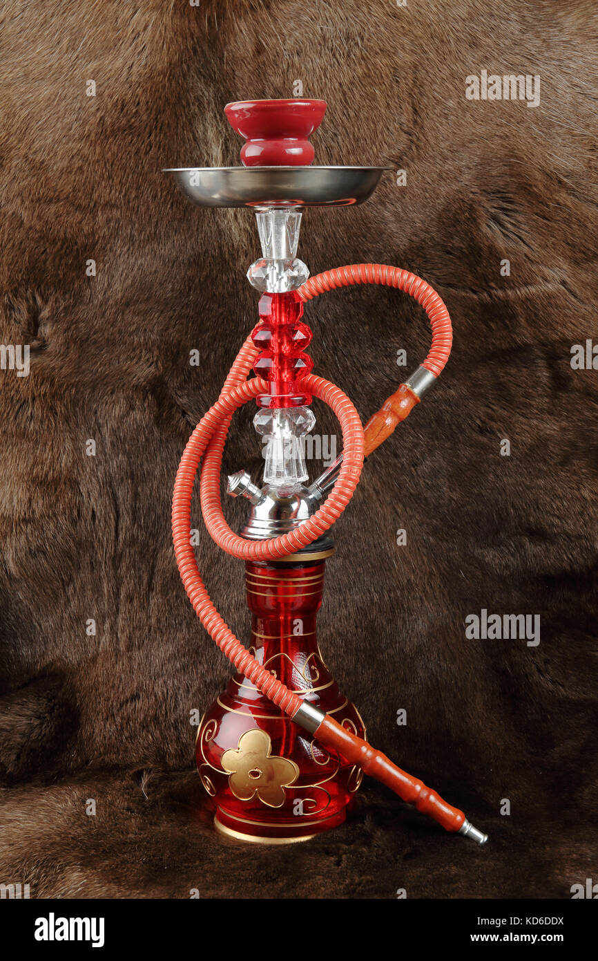 Red hookah on the fur Stock Photo - Alamy