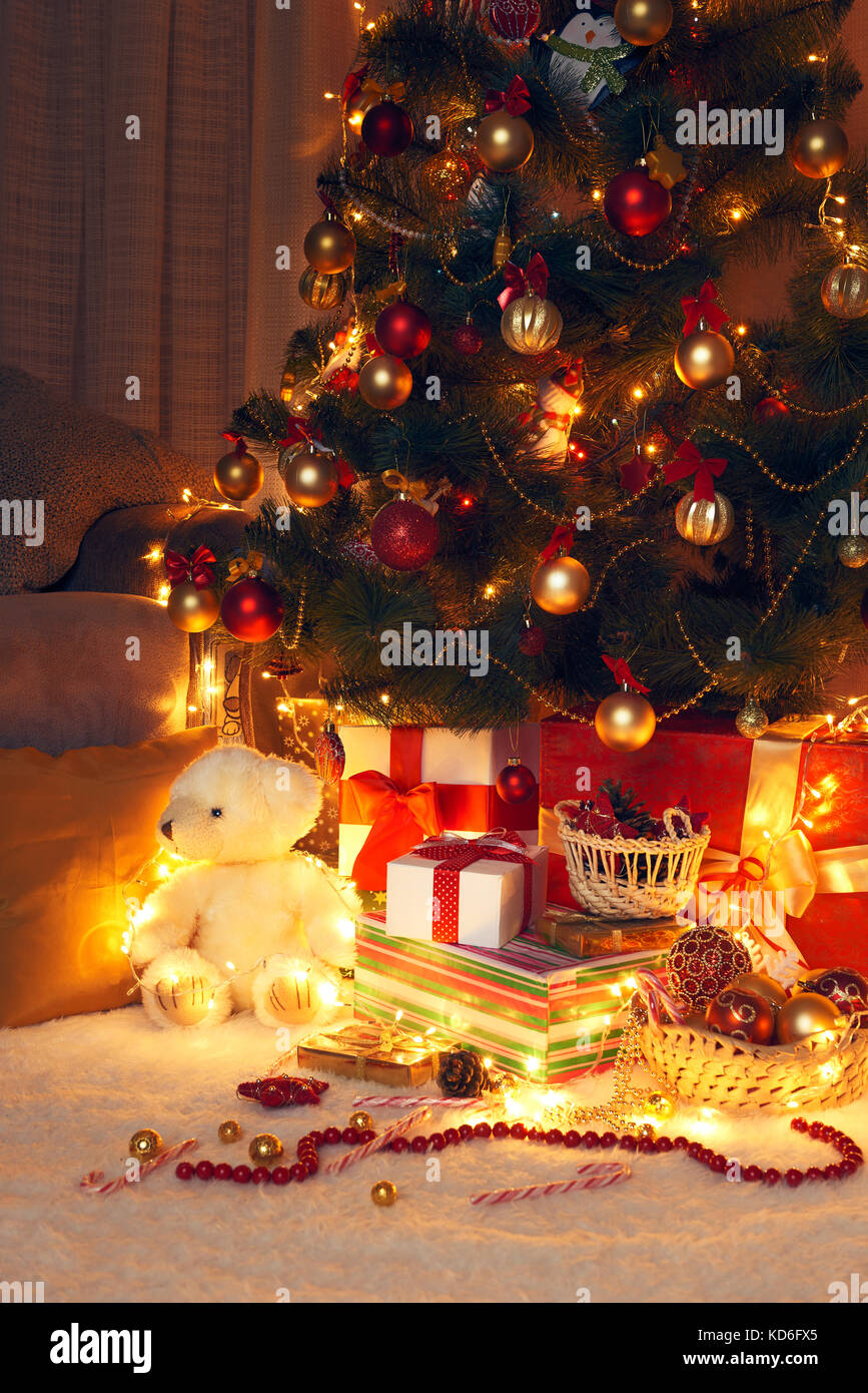 Christmas tree with decoration and illumination in home at night Stock ...