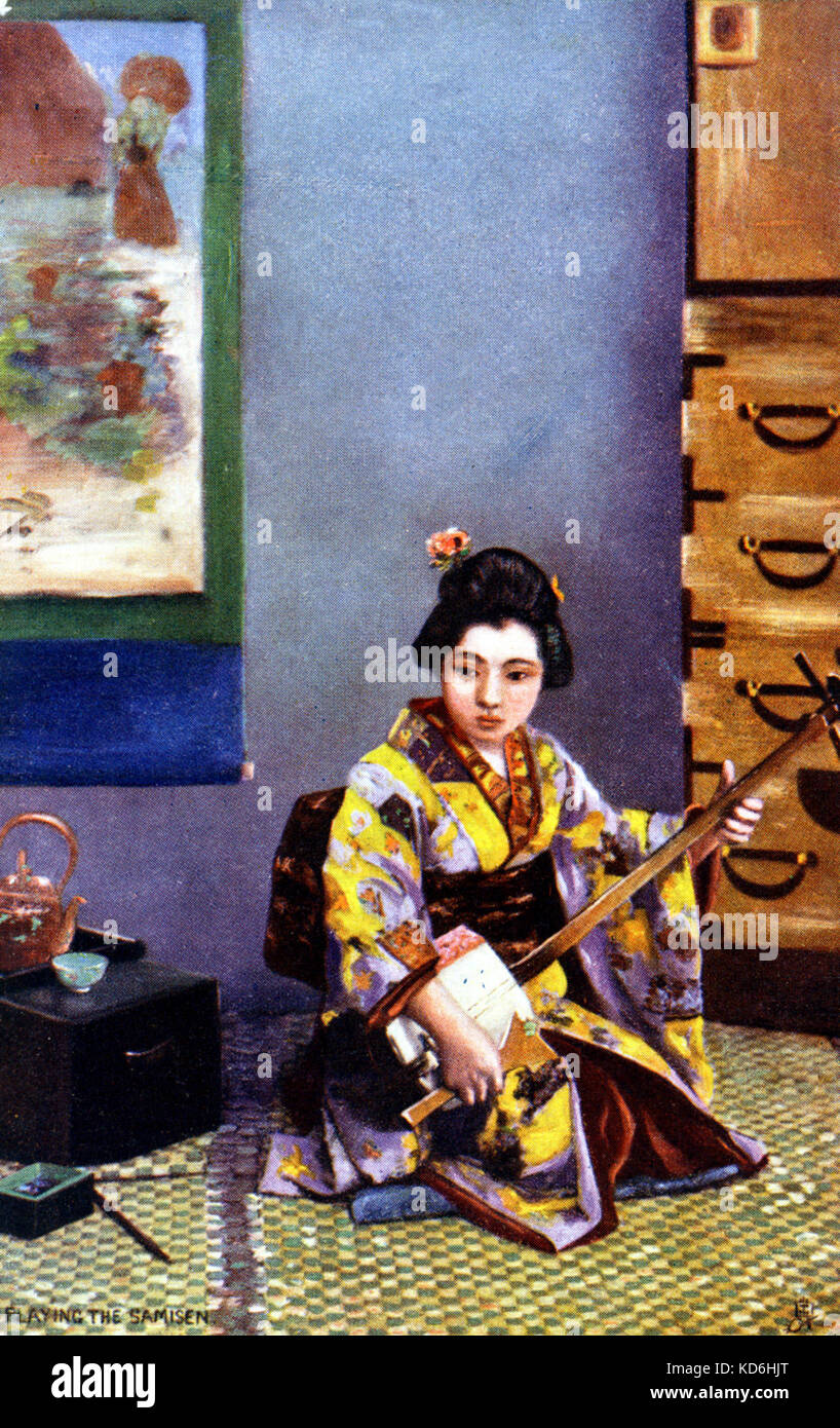 Samisen being played by Japanese woman wearing a traditional kimono ...