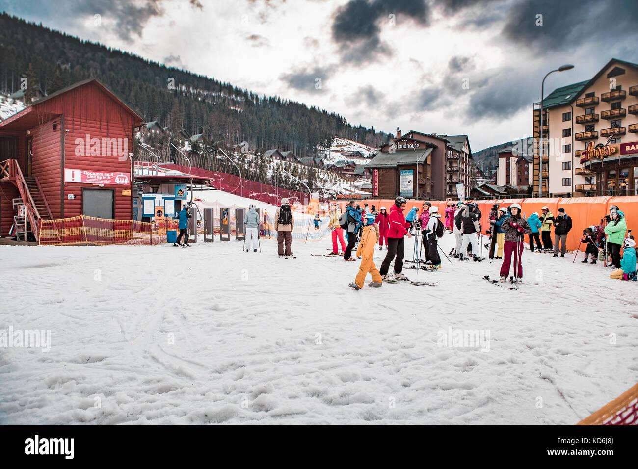 BUKOVEL, UKRAINE, March 06, 2017: Skiers and tourists in the Ukrainian ...