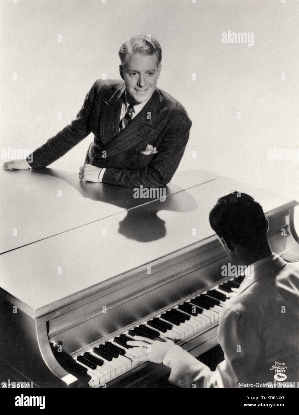 Nelson Eddy - portrait of the American actor and singer leaning over ...