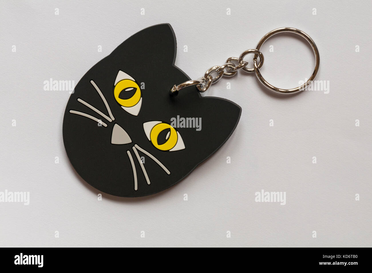 Black cat keyring key ring for Halloween isolated on white background ...