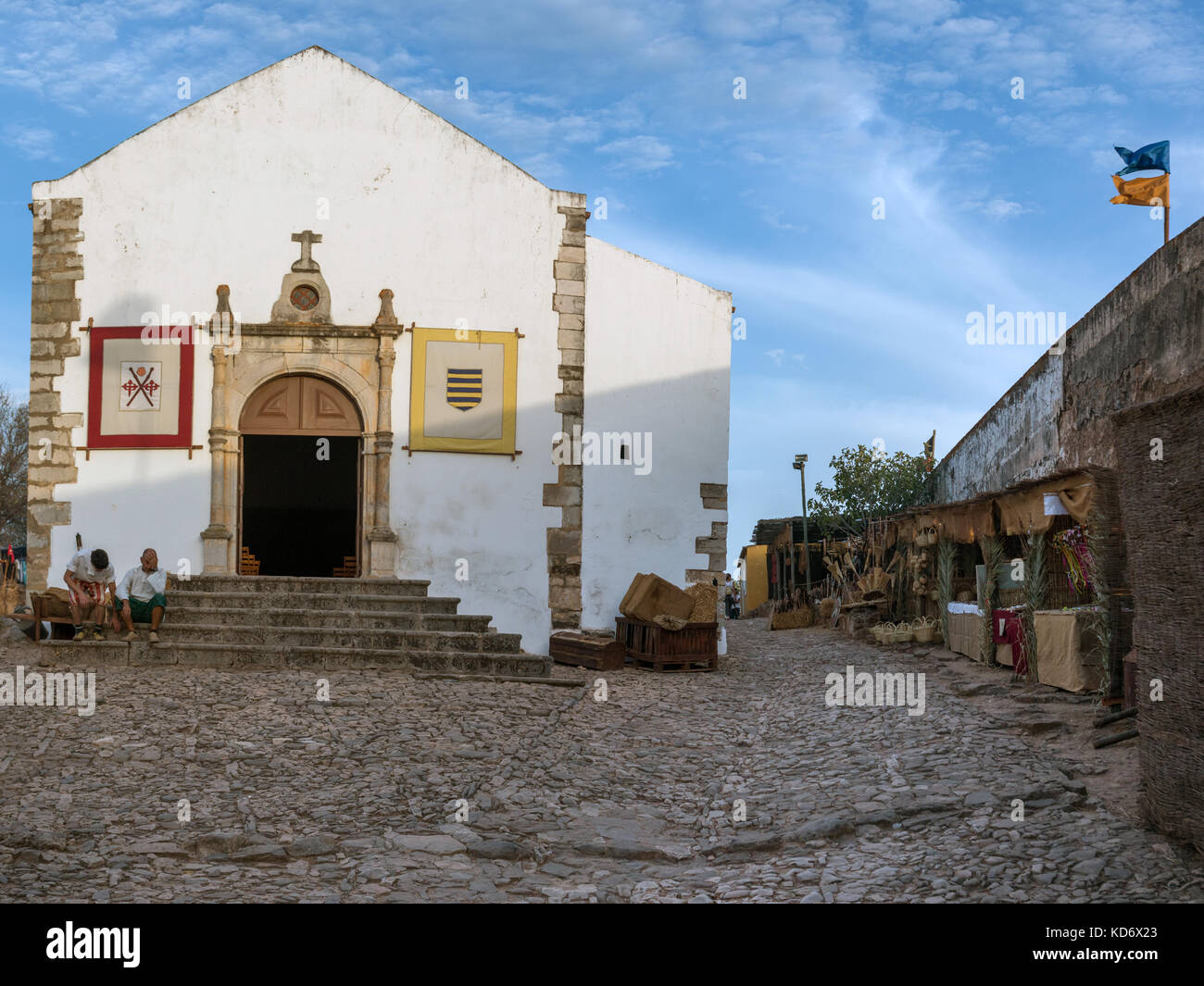 View of a Medieval church inside the castle and several typical shops ...
