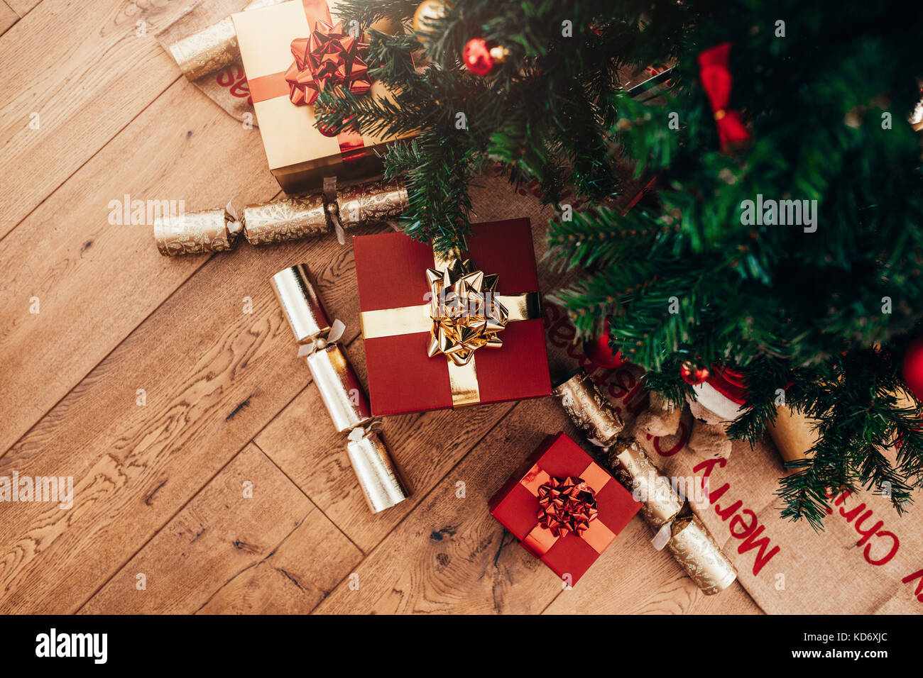 Christmas background with decorations and gift boxes on wooden floor ...