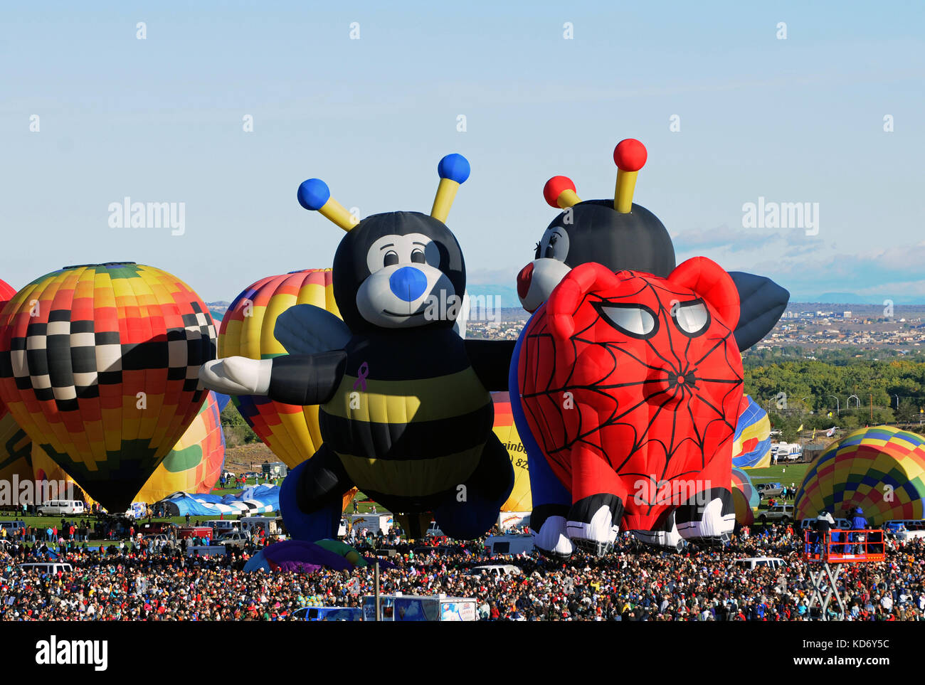 Albuquerque, NM - October 8: Crowds cheer hot air balloon flight crews ...