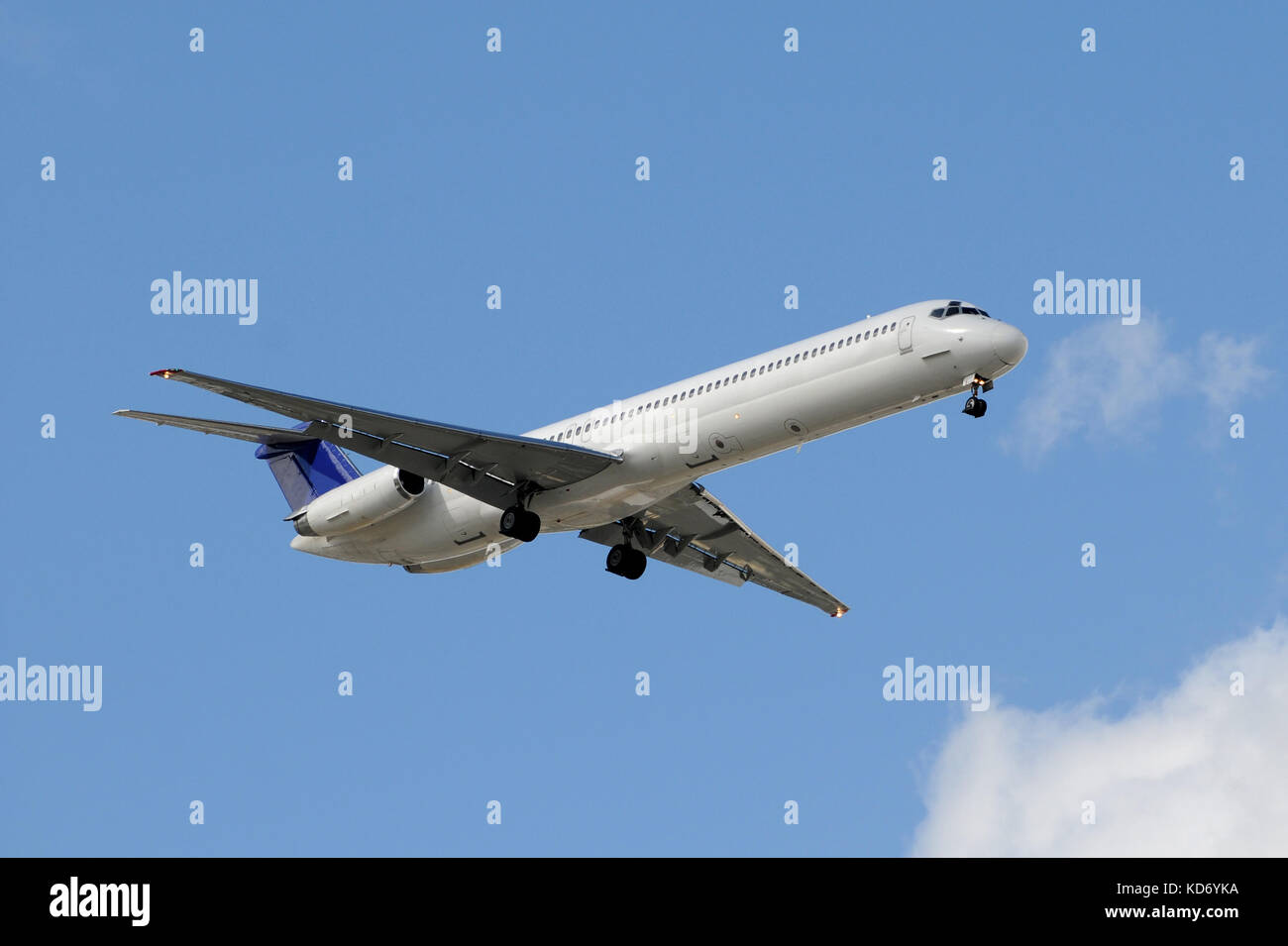Modern jet airplane descending for landing Stock Photo - Alamy