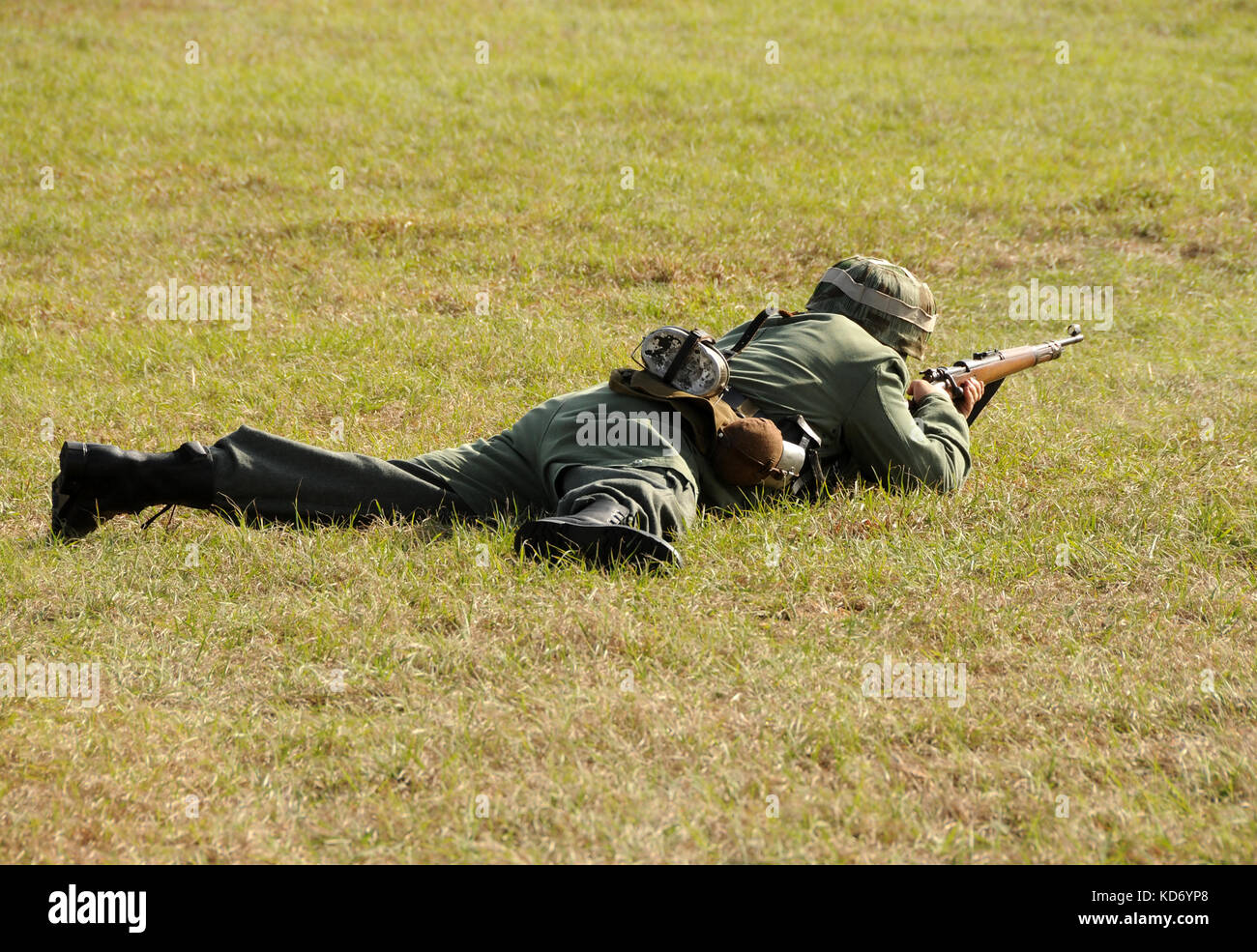 World War II era soldier lying on the ground Stock Photo - Alamy