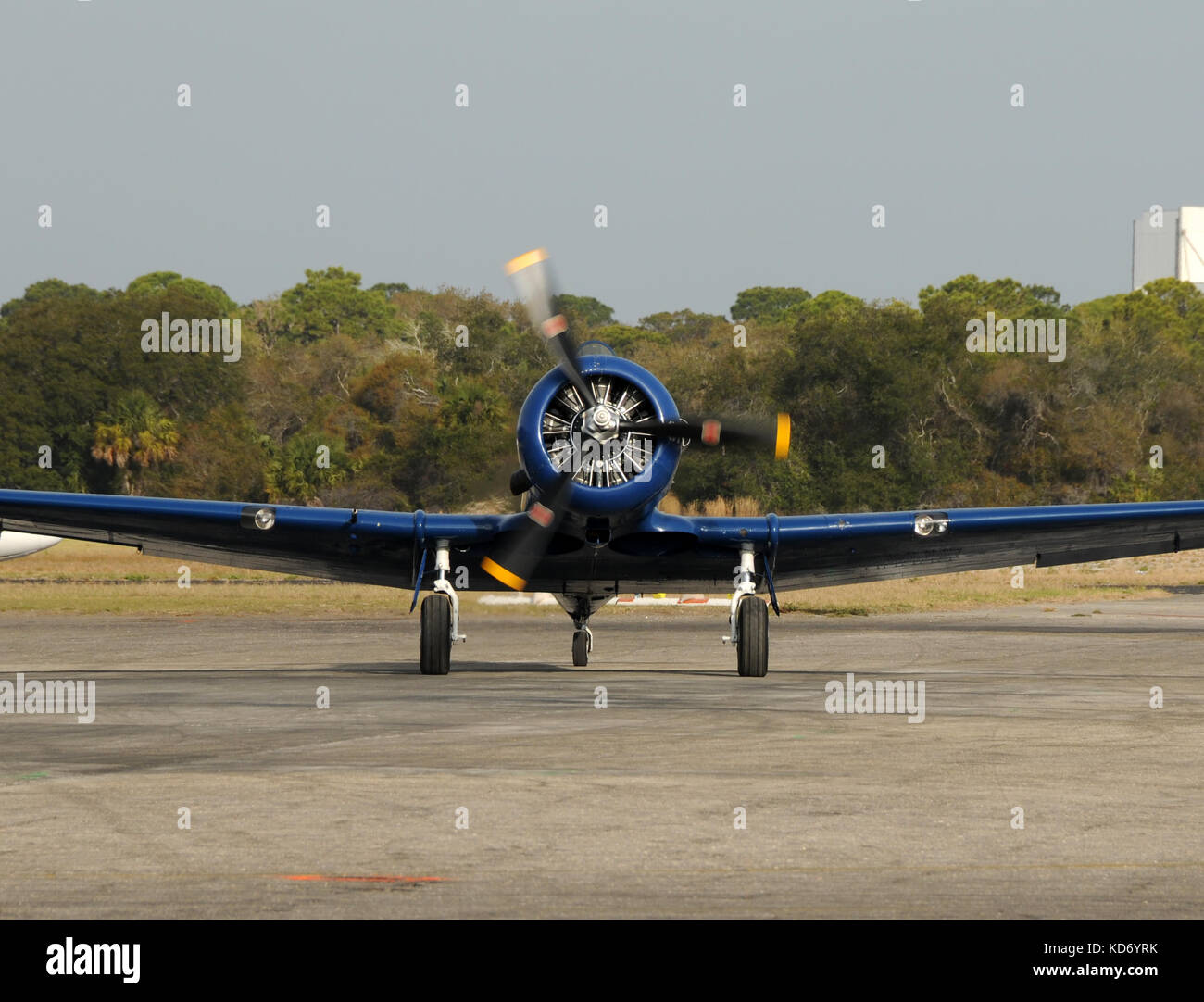 Retro blue propeller airplane on the ground Stock Photo - Alamy