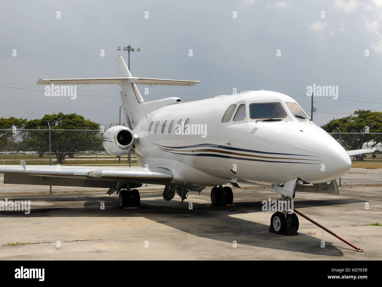 Luxury private jet for charter travel parked on the ground Stock Photo ...
