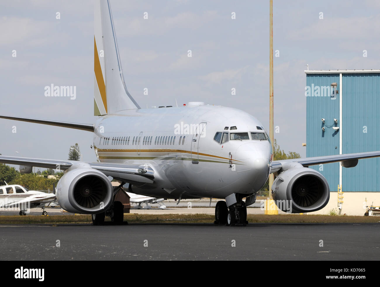 Modern passenger jet airplane parked on the ground Stock Photo - Alamy