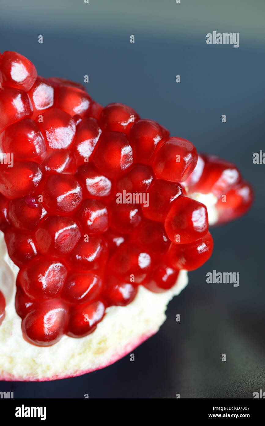 Fresh open pomegranate Stock Photo - Alamy