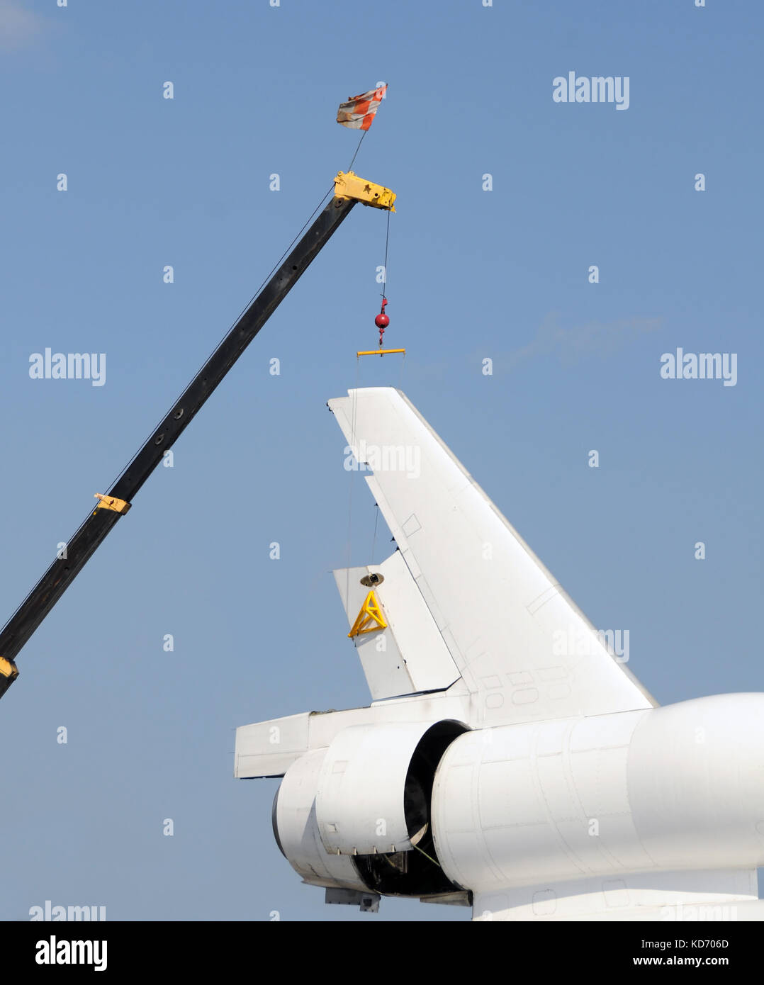 Removing the rudder from a big jet airplane Stock Photo - Alamy