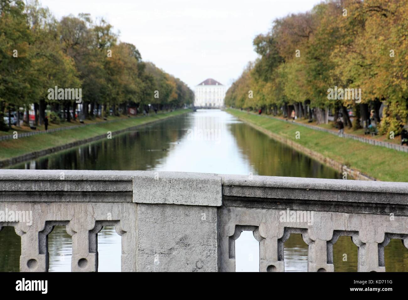 Bridge with view on canal to castle in Munich Stock Photo - Alamy