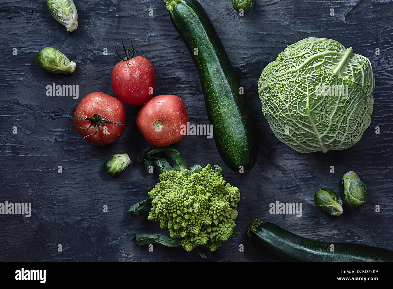 Organic vegetables on wooden table. Top view Stock Photo - Alamy