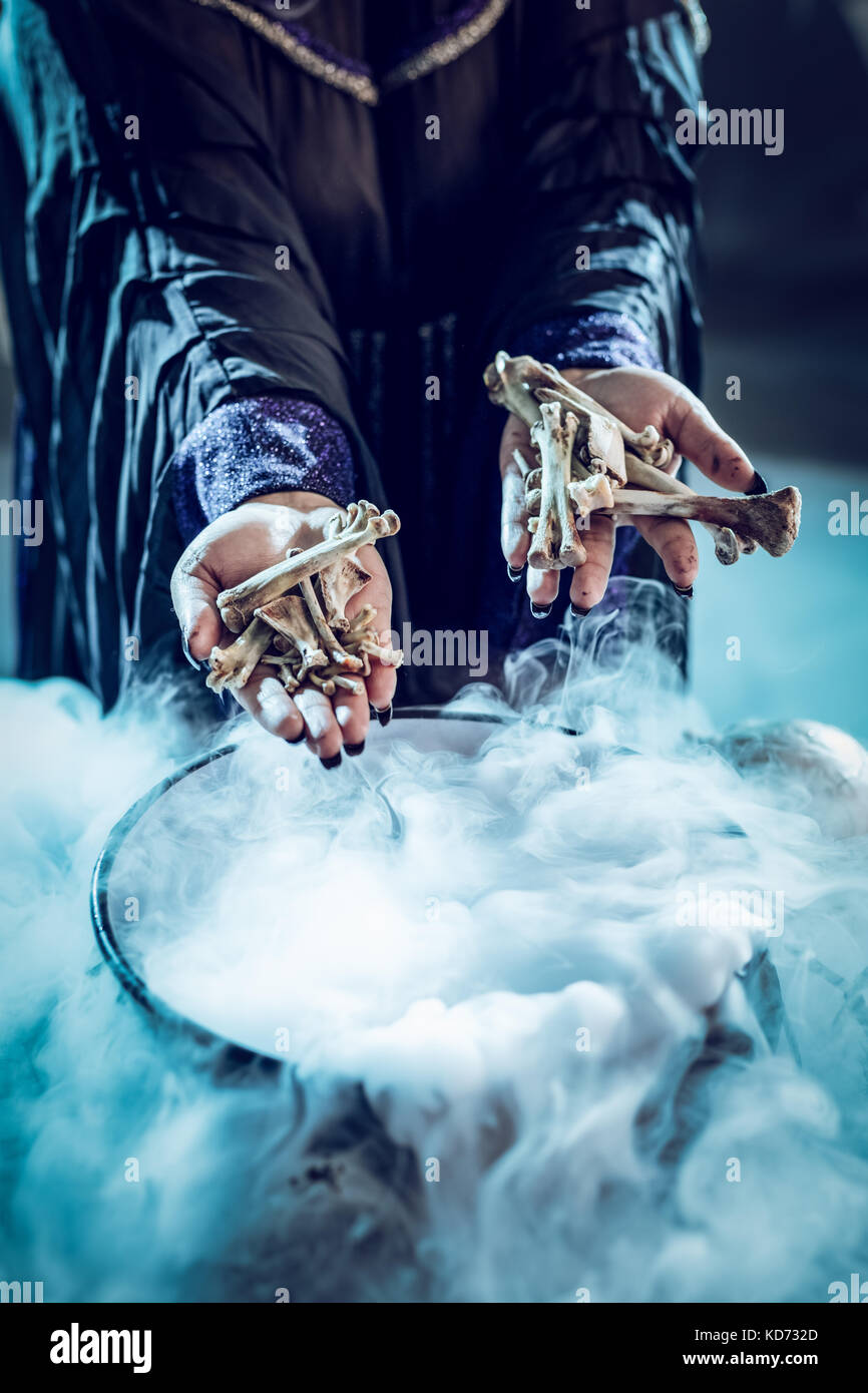 Hands holding water cauldron hi-res stock photography and images - Alamy