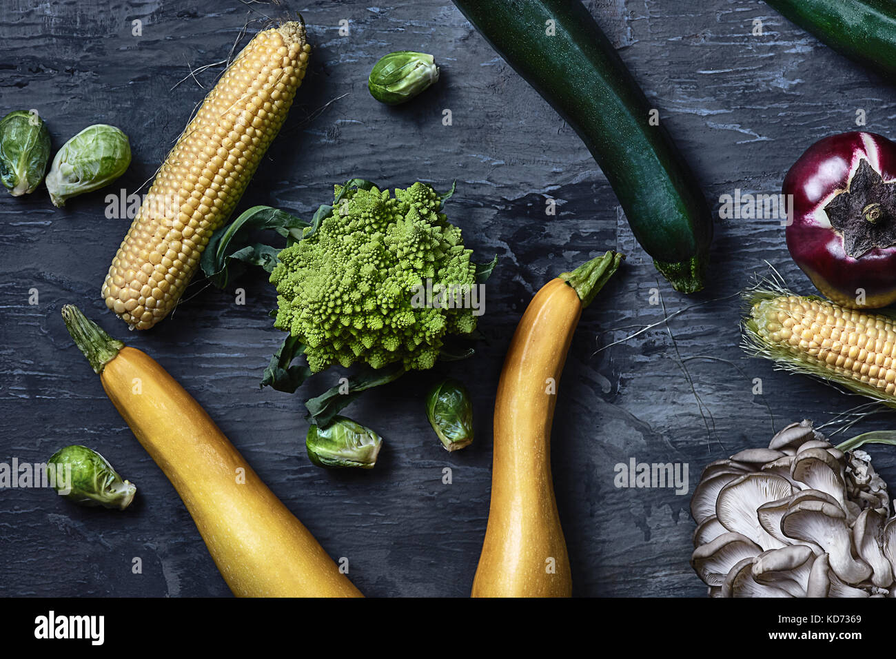 Organic vegetables on wooden table. Top view Stock Photo - Alamy