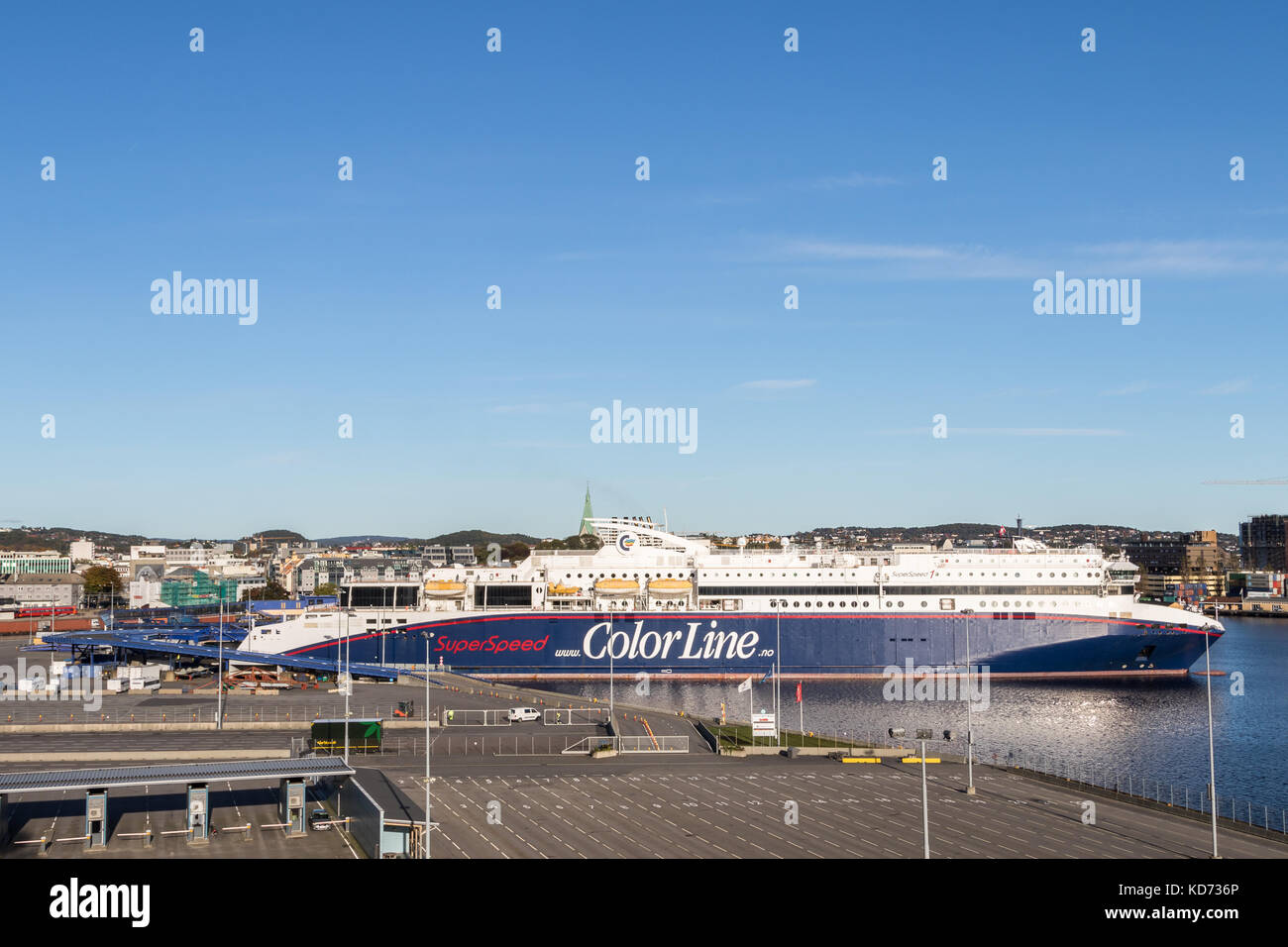The Color Line ferry in the port of Kristiansand, sun and blue sky ...