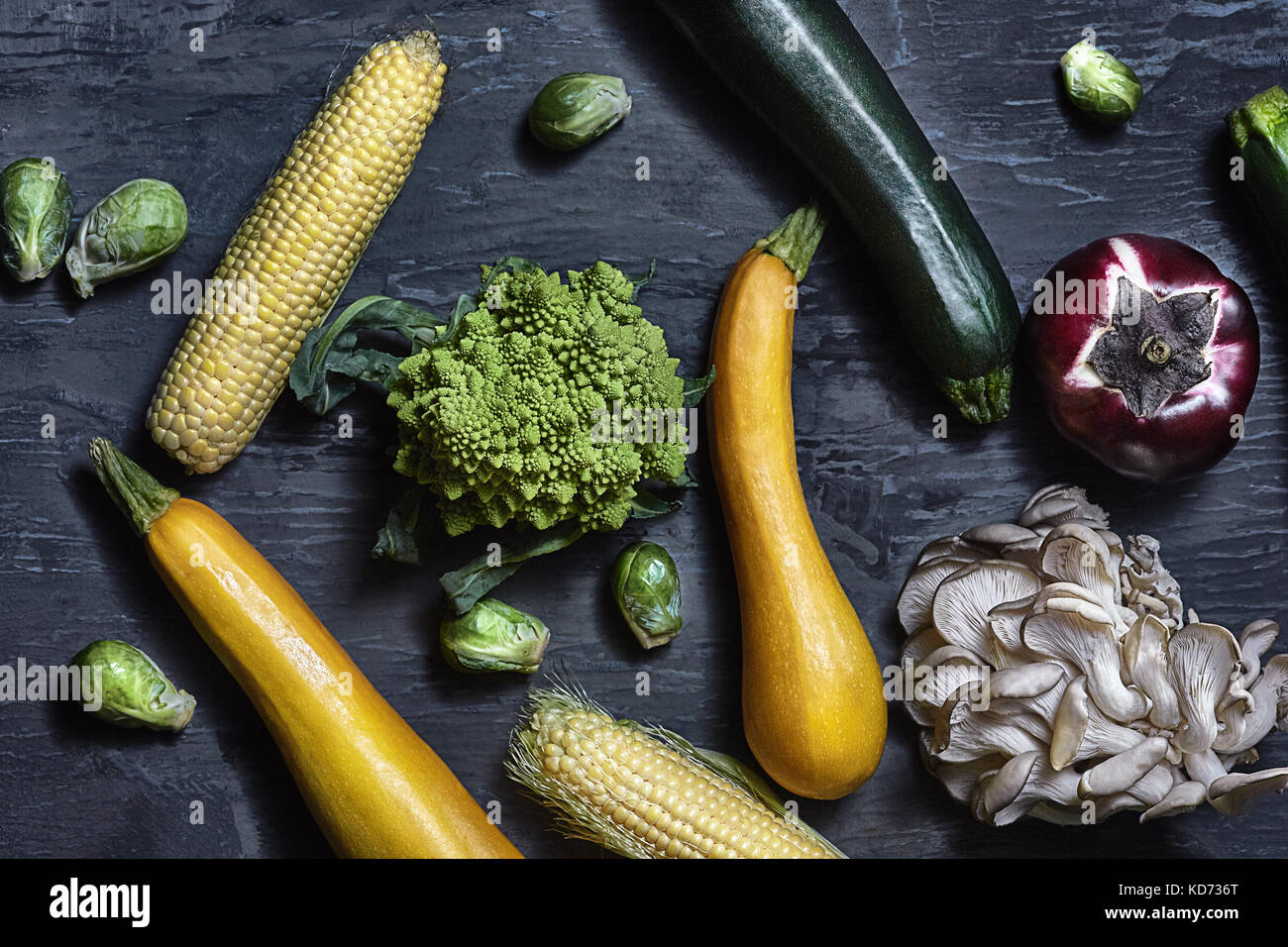 Organic vegetables on wooden table. Top view Stock Photo - Alamy