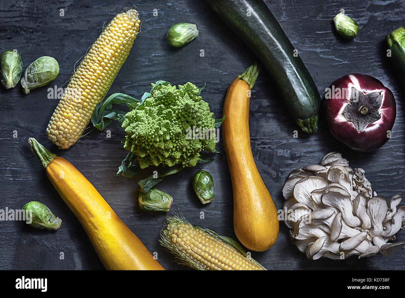 Organic vegetables on wooden table. Top view Stock Photo - Alamy