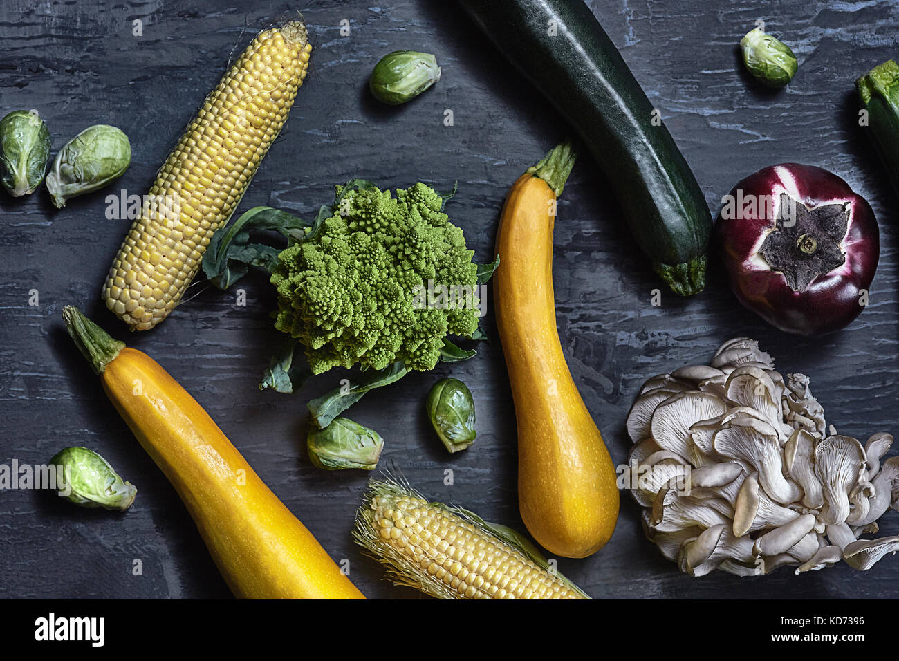 Organic vegetables on wooden table. Top view Stock Photo - Alamy