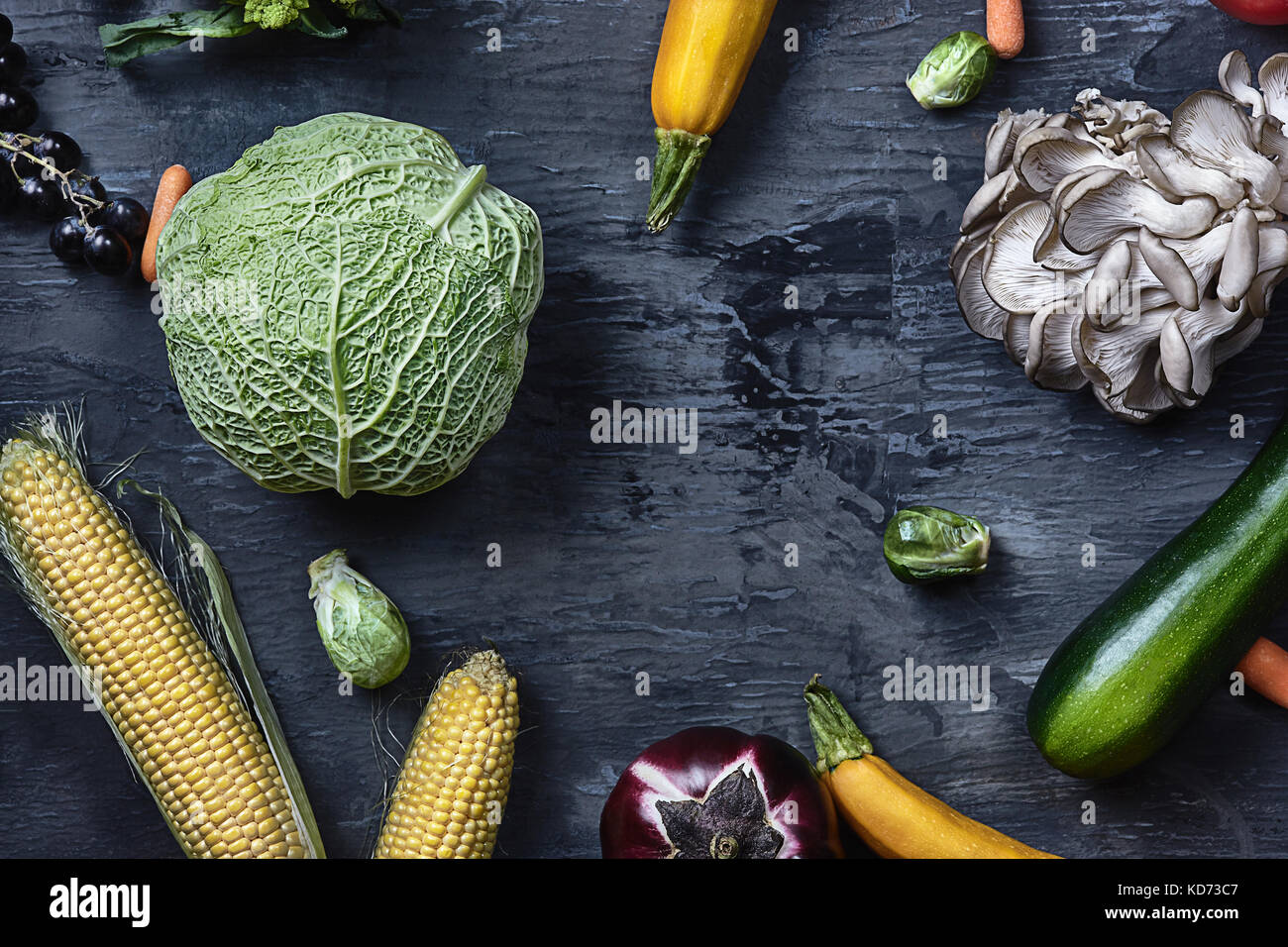 Organic vegetables on wooden table. Top view Stock Photo - Alamy