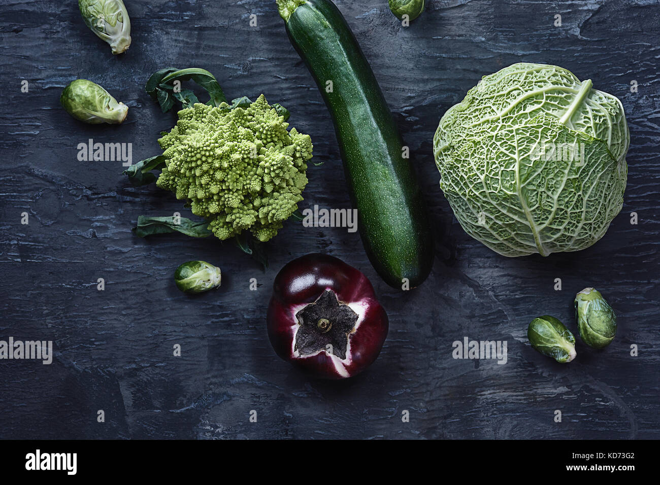 Organic vegetables on wooden table. Top view Stock Photo - Alamy