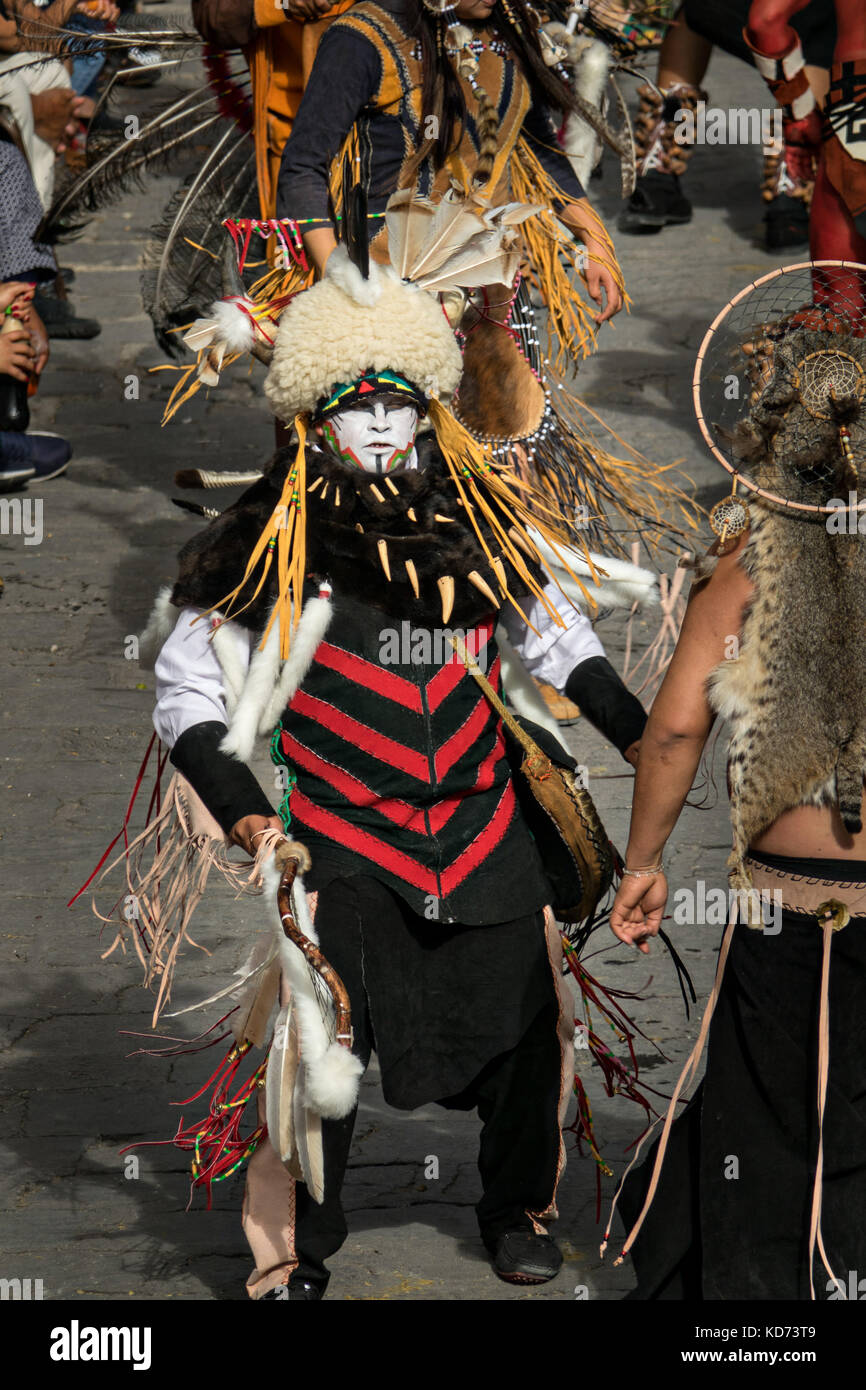 Concheros dance in a procession through the historic district during ...