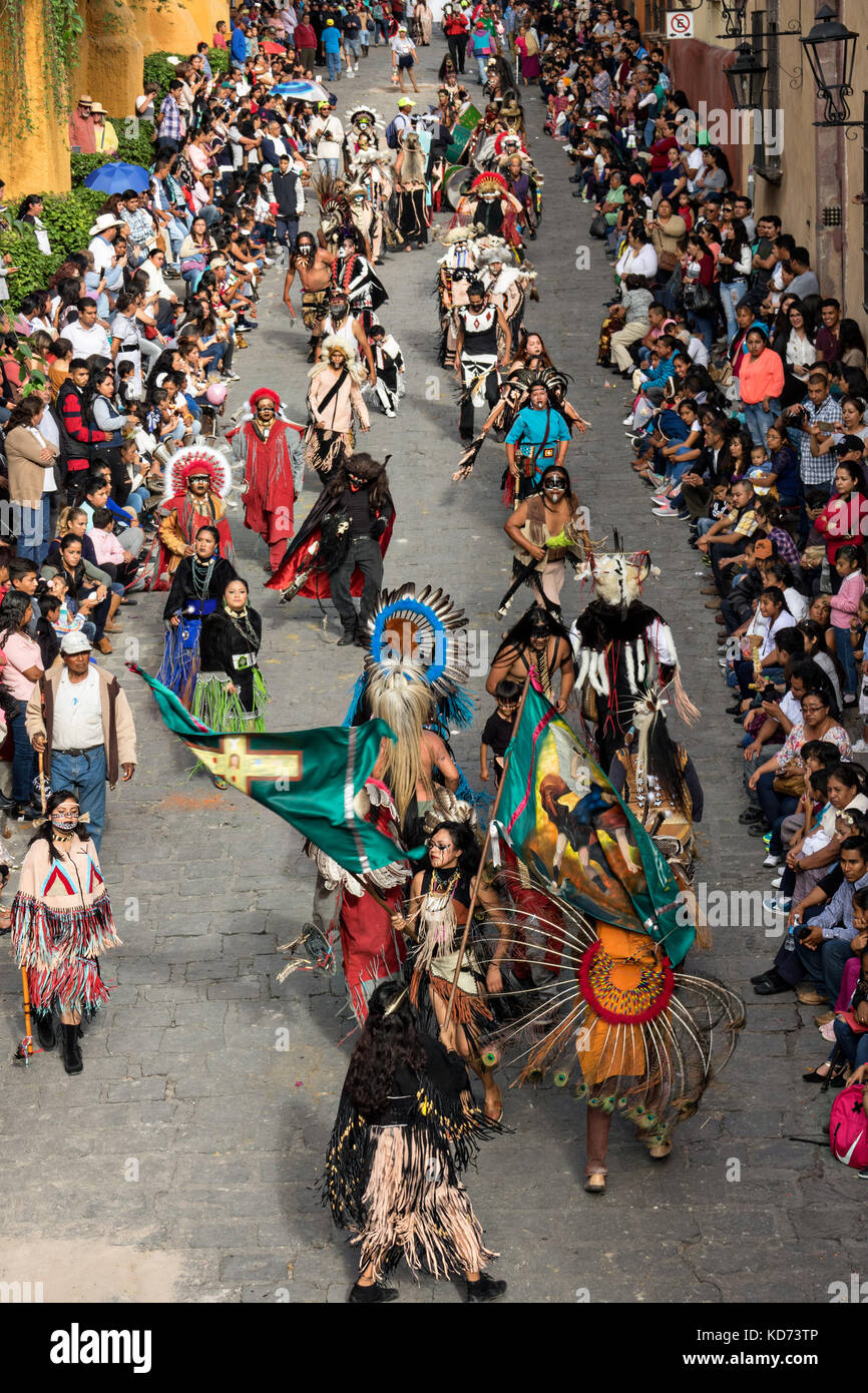 Concheros dance in a procession through the historic district during ...