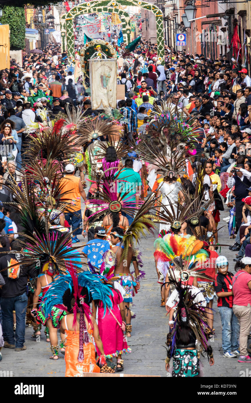 Concheros dance in a procession through the historic district during ...