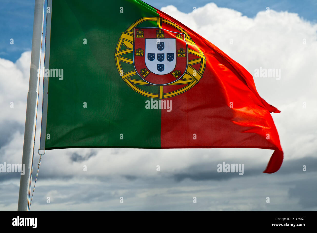 Flag of Portugal fluttering in the wind in the sky Stock Photo - Alamy