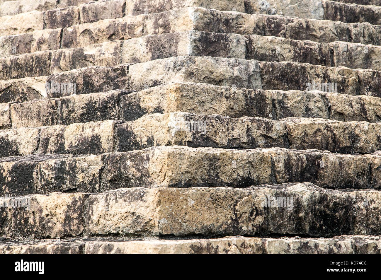 Pyramidal structure made of stones. Stepped structure made of stone ...