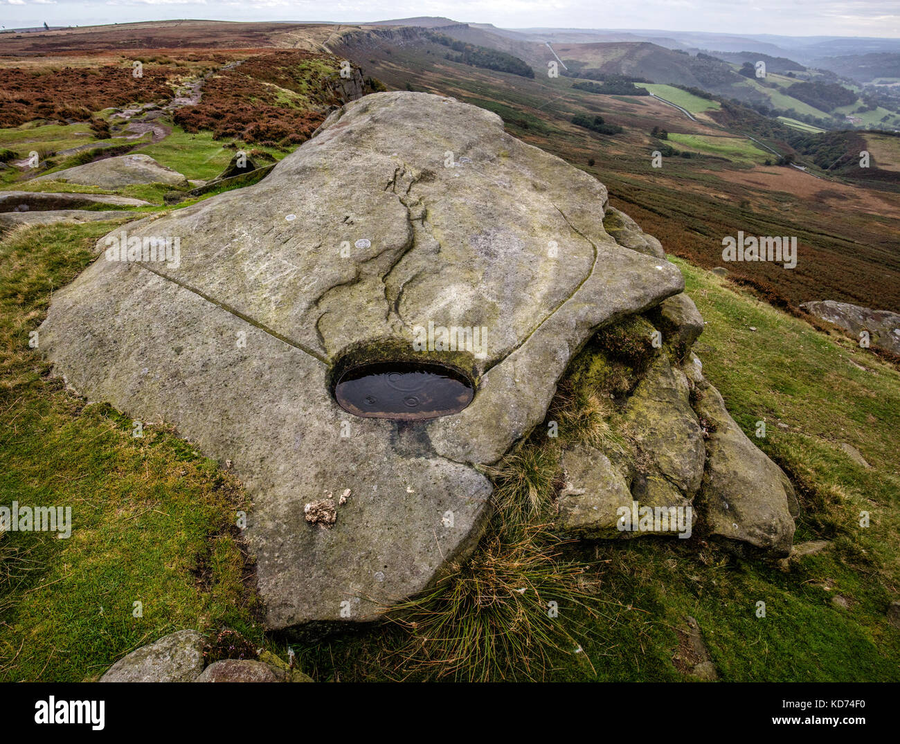 Numbered carved rock basin 4 on Stanage Edge near Hathersage in the ...