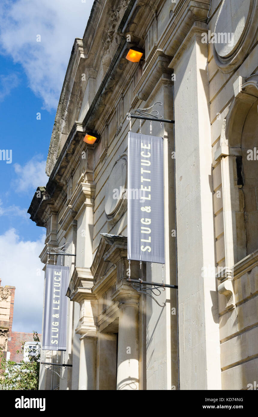Banners hanging outside the Slug and Lettuce pub in The Cross ...