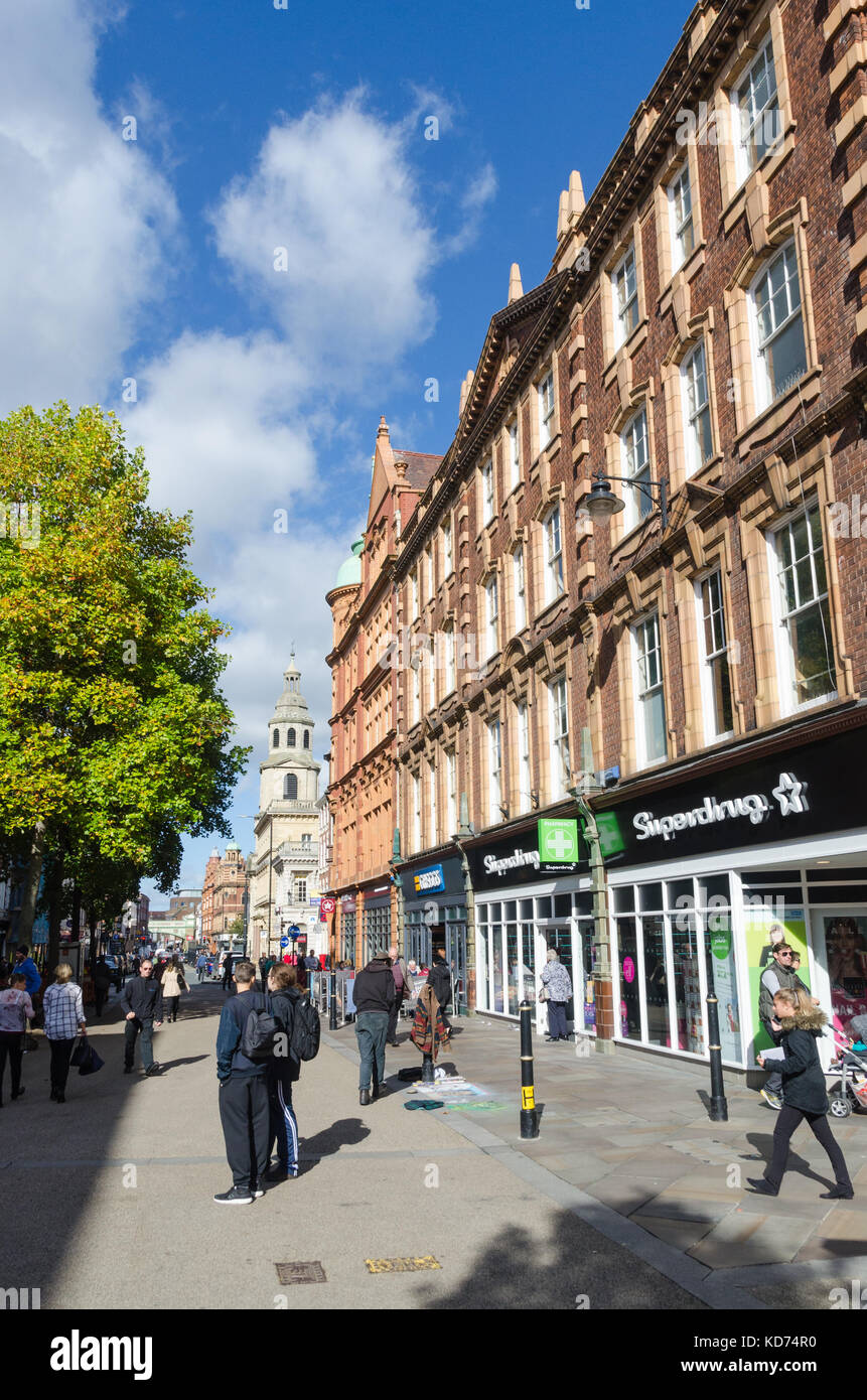 Shops and shoppers in Worcester High Street Stock Photo - Alamy