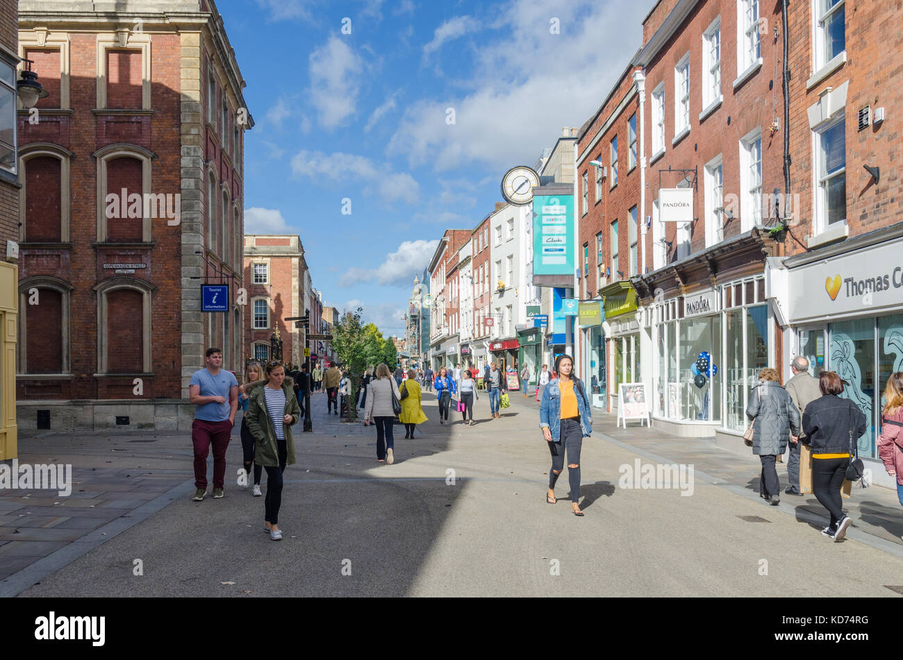 Shops and shoppers in Worcester High Street Stock Photo - Alamy