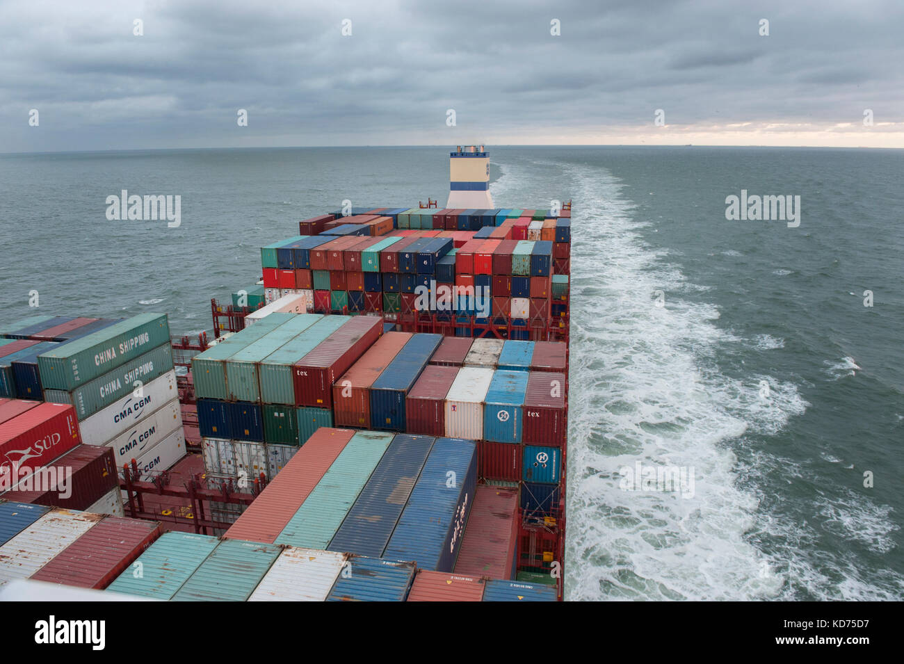 Looking astern from the bridge over the deck of a container ship ...