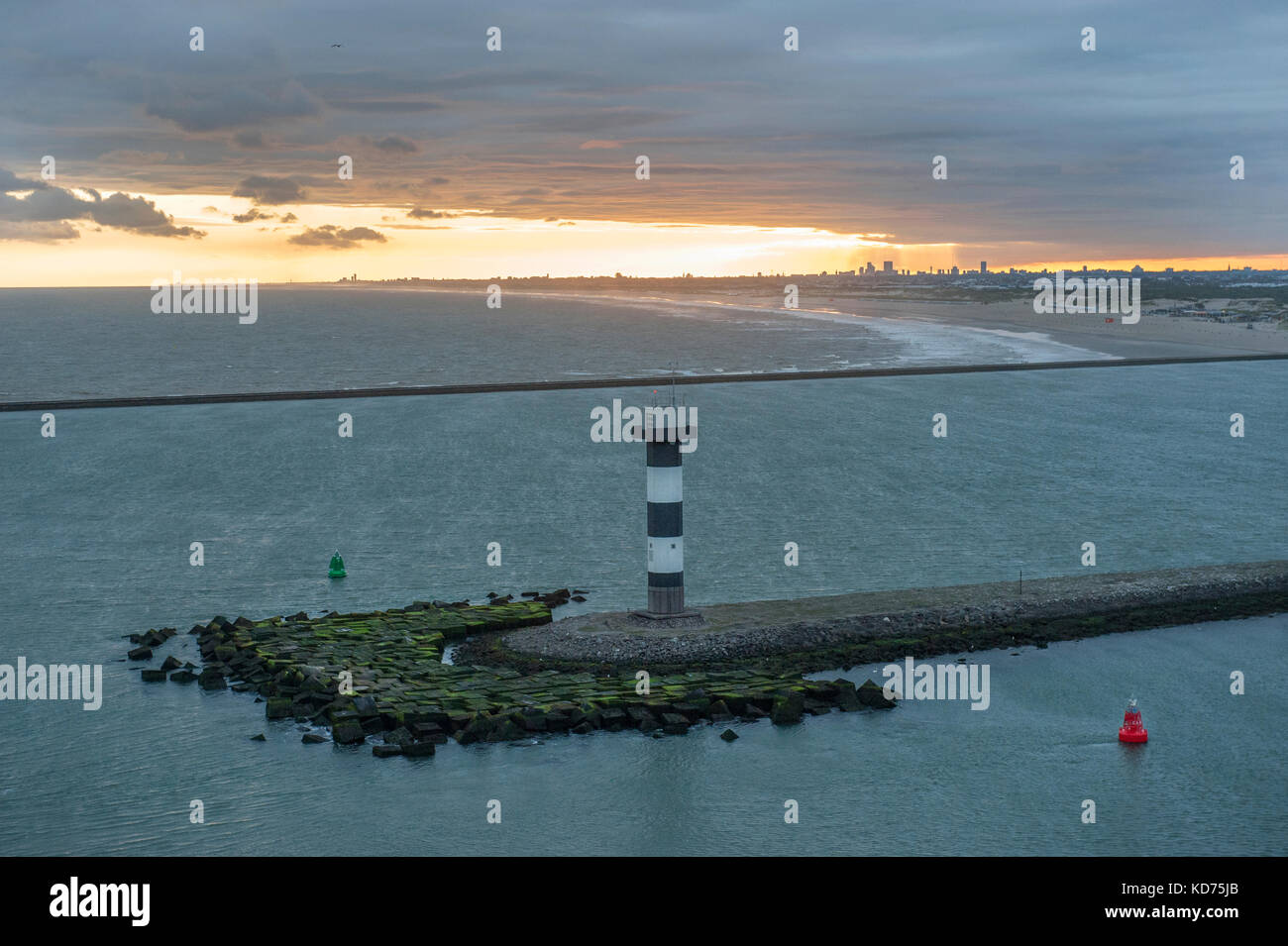 Lighthouse at the entrance to the fairway leading to the port of ...