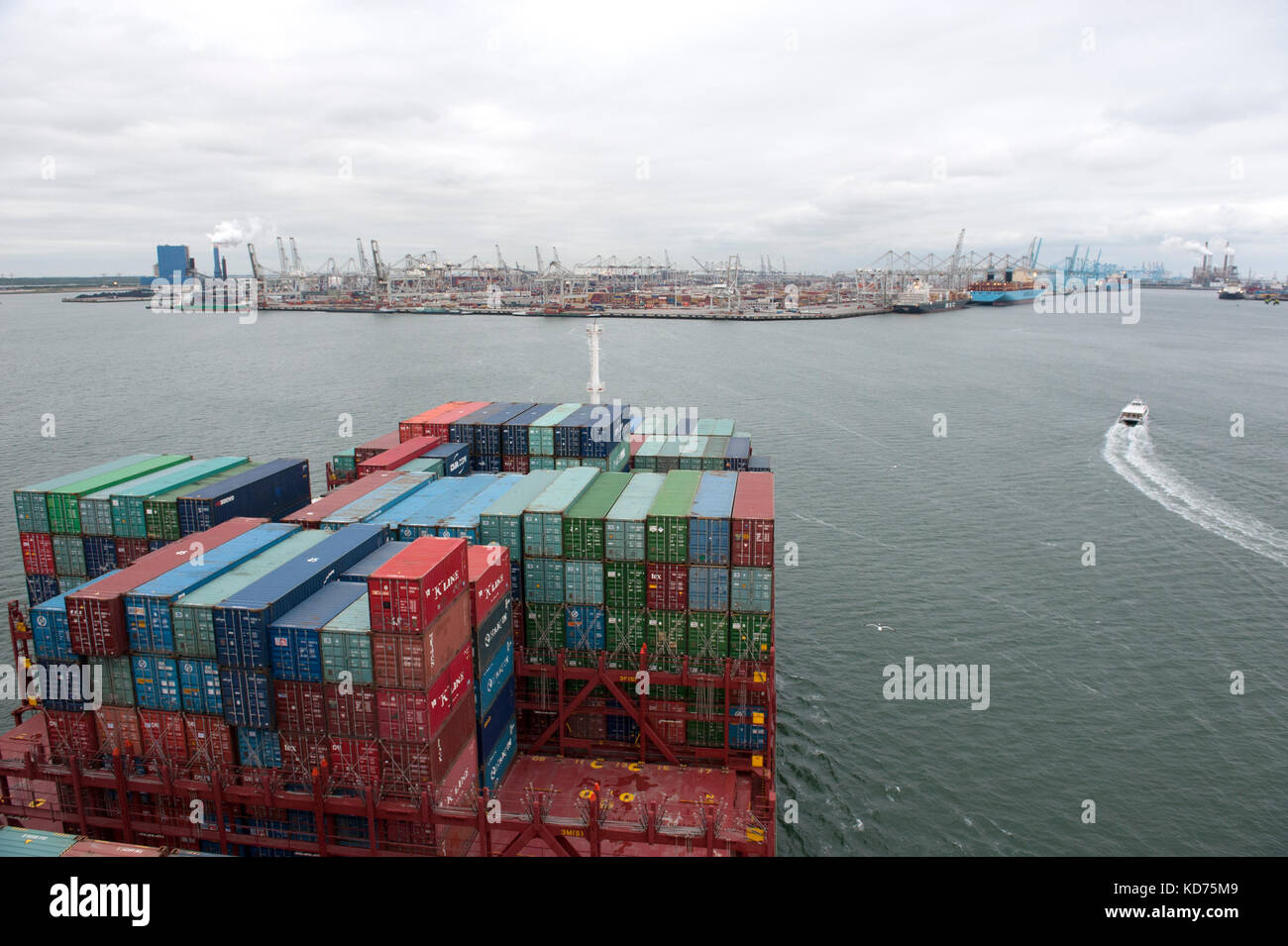 Rotterdam container port with container ships, cargo ships and cranes ...